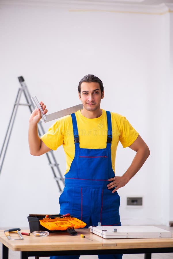 Young Male Carpenter Working Indoors Stock Image - Image of repairman ...