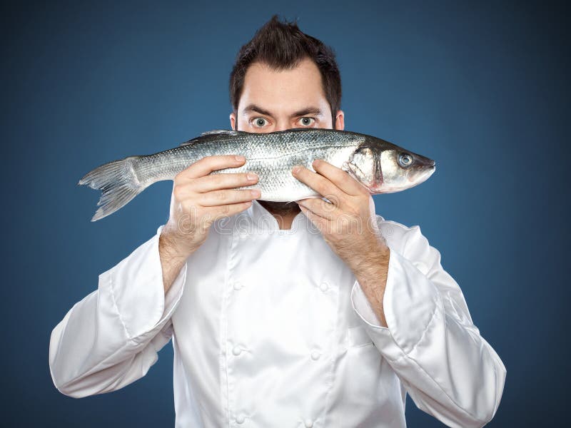 Young Male Chef with Seabass Fish Stock Photo - Image of seabass ...