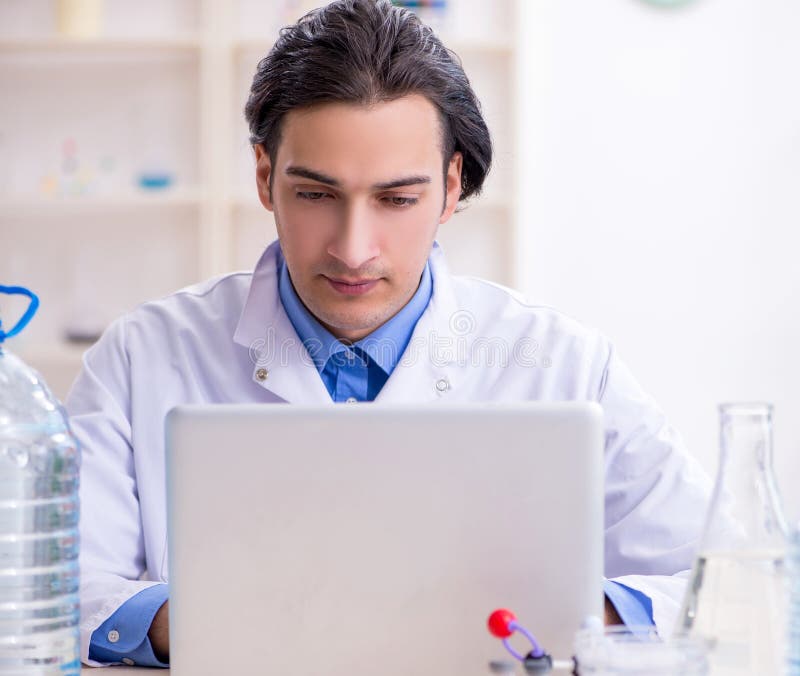 Young Male Chemist Experimenting in Lab Stock Image - Image of ...