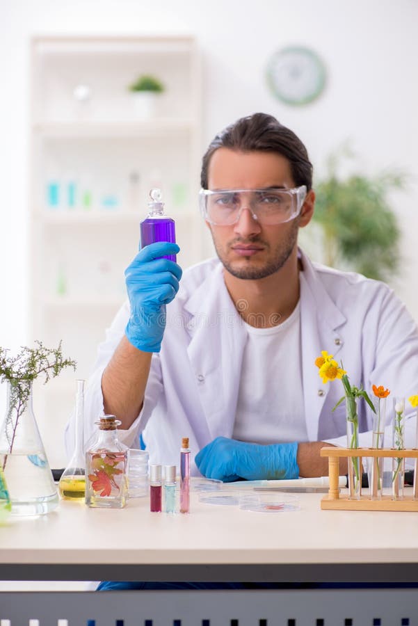 Young Male Chemist in Perfume Synthesis Concept Stock Image - Image of ...