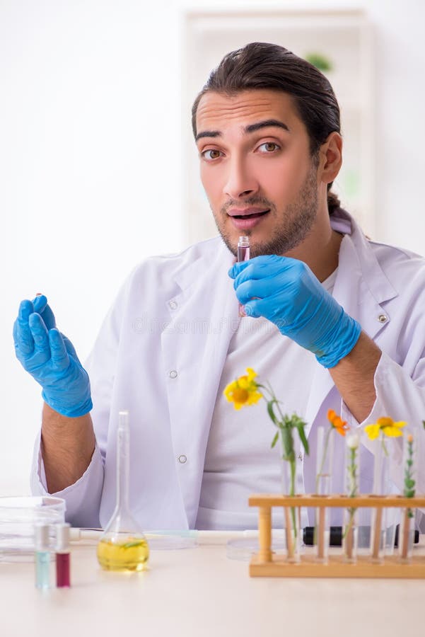 Young Male Chemist in Perfume Synthesis Concept Stock Image - Image of ...