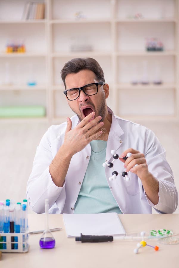 Young Male Chemist Sitting at the Lab Stock Image - Image of molecular ...