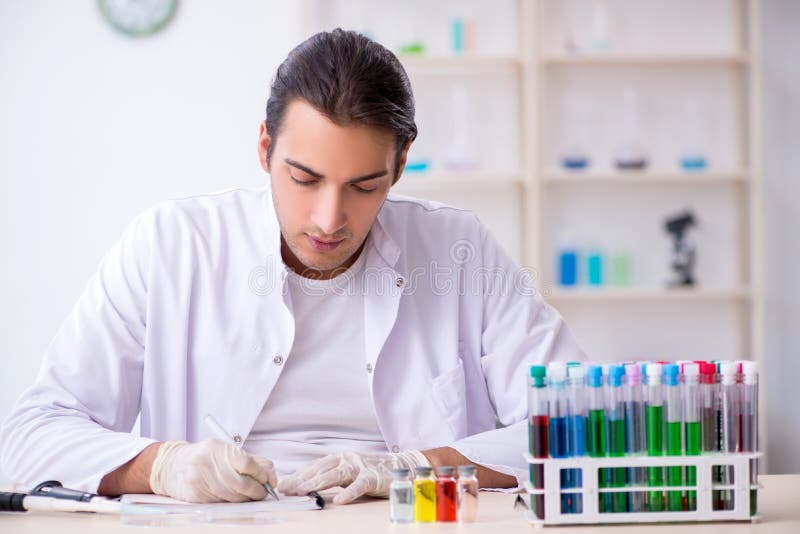 Young Male Chemist Working in the Lab Stock Image - Image of ...