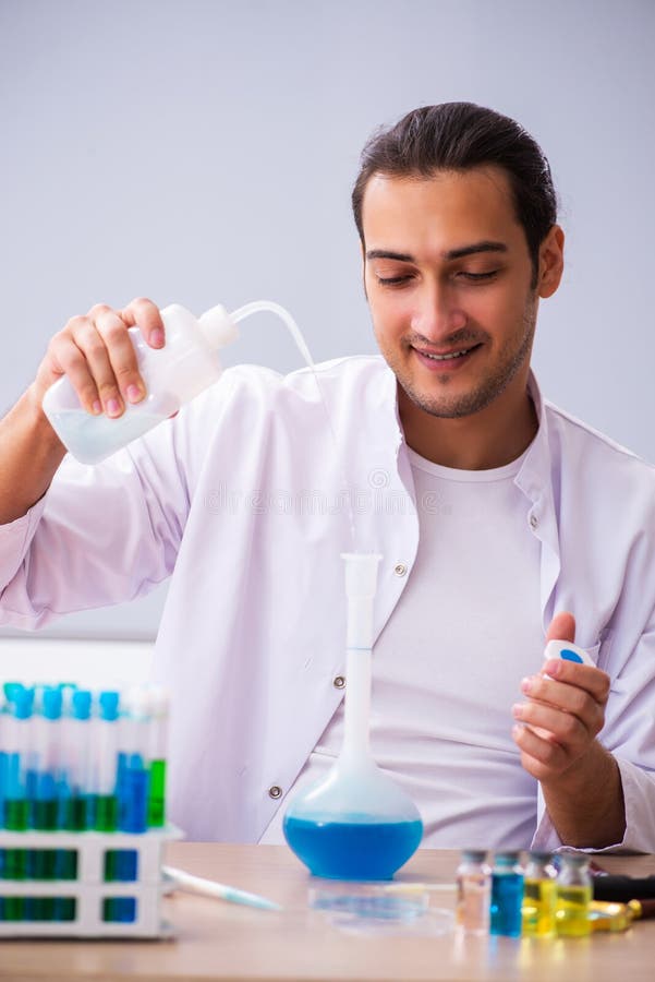 Young Male Chemistry Teacher in the Classroom Stock Image - Image of ...