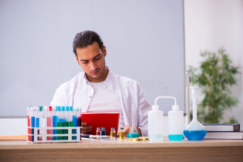 Young Male Chemistry Teacher in the Classroom Stock Image - Image of ...