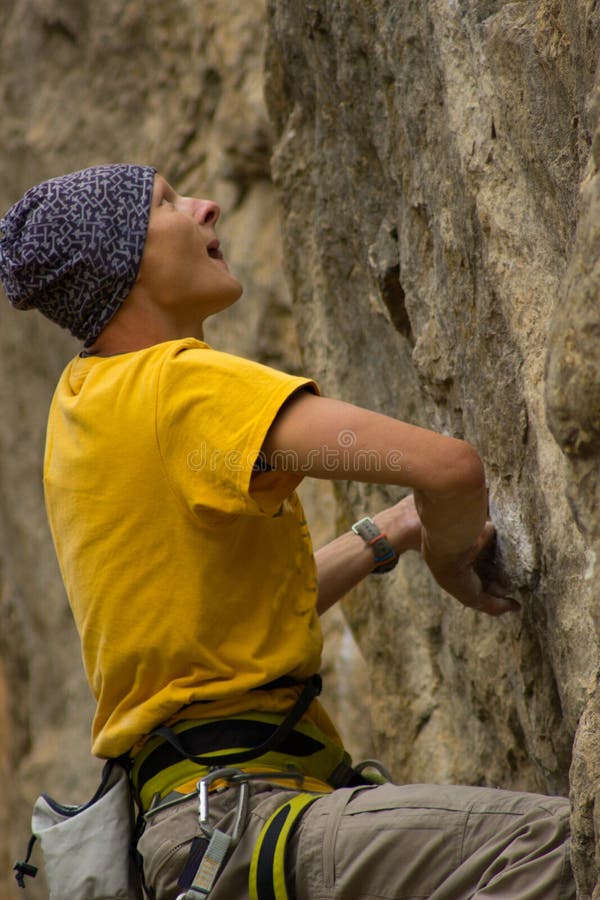 Young Male Climber Hanging by a Cliff. Stock Photo - Image of extreme ...