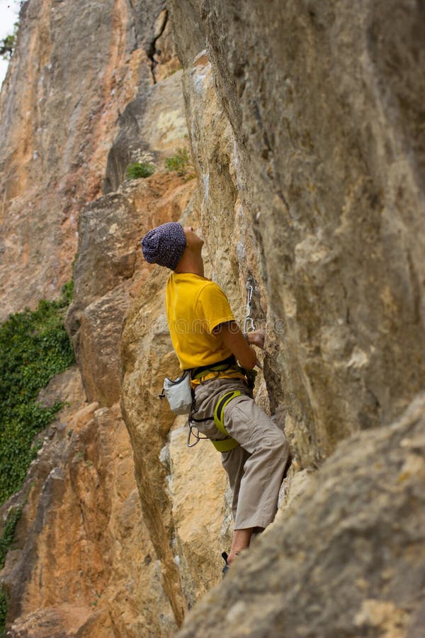 Young Male Climber Hanging by a Cliff. Stock Image - Image of cliff ...