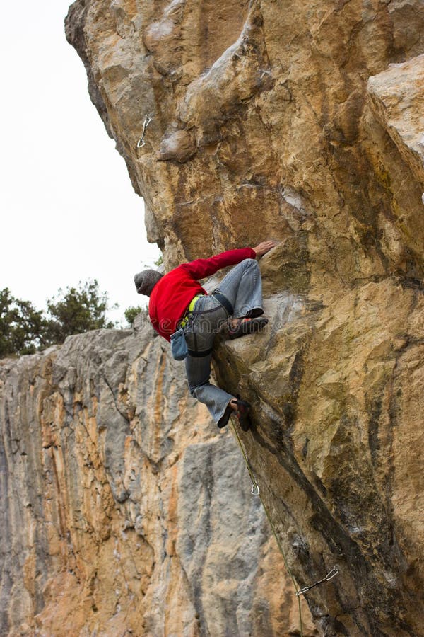 Young Male Climber Hanging on a Cliff. Stock Photo - Image of mountain ...