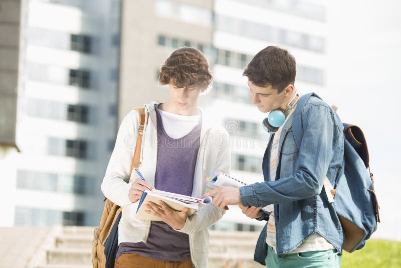 Young Male College Students Studying at Campus Stock Image - Image of ...