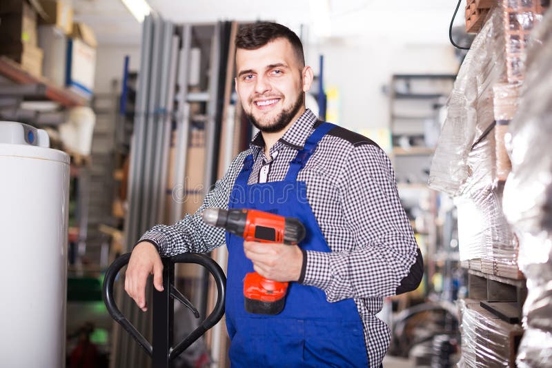 Worker Shows a Variety of Motorcycle Stock Image - Image of dark ...