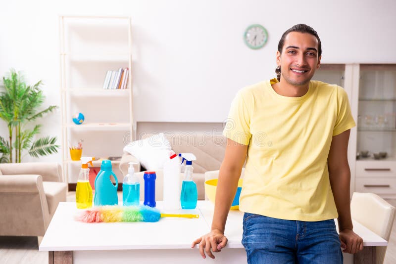Young Male Contractor Doing Housework at Home Stock Image - Image of ...