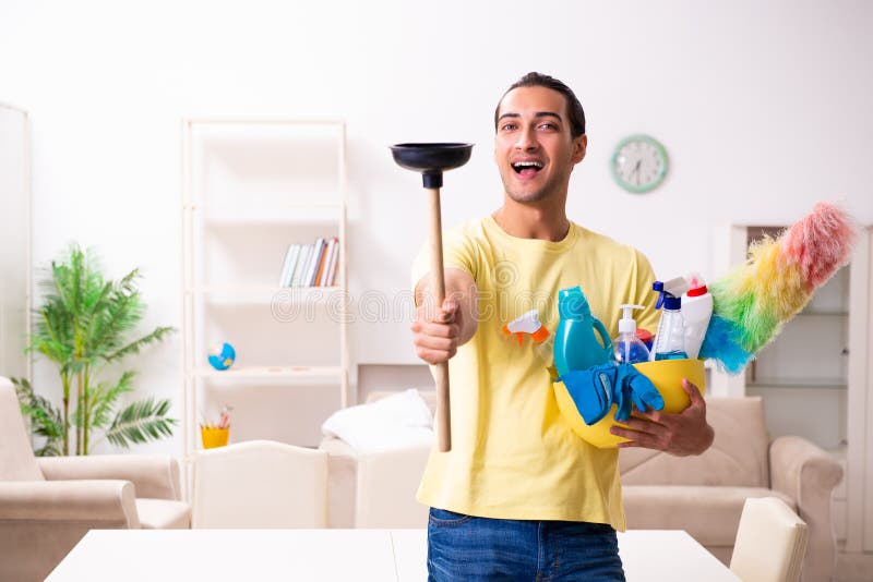 Young Male Contractor Doing Housework at Home Stock Image - Image of ...
