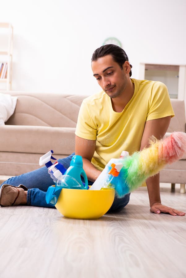 Young Male Contractor Doing Housework at Home Stock Image - Image of ...