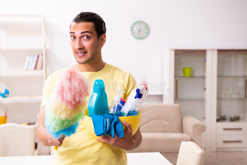 Young Male Contractor Doing Housework at Home Stock Photo - Image of ...