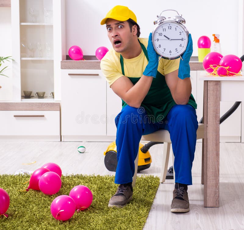 Young Male Contractor Doing Housework after Party Stock Photo - Image ...