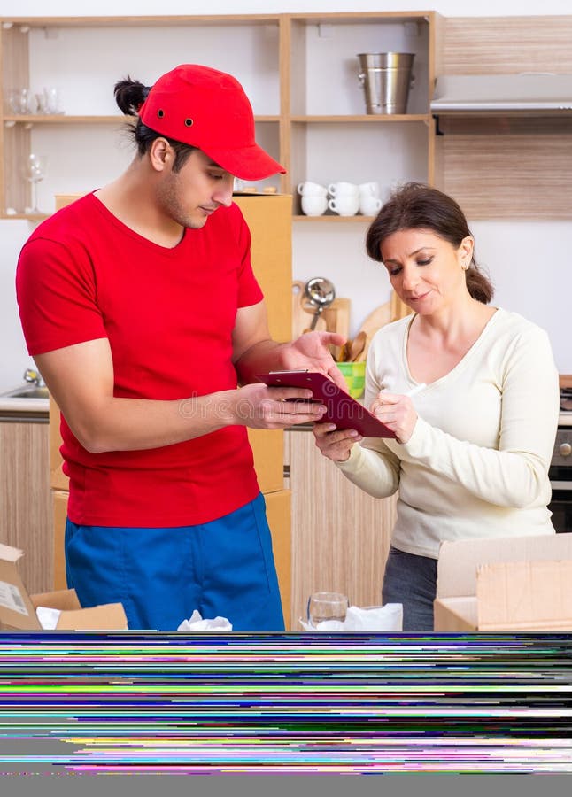 Young Male Contractor and Female Customer in Moving Concept Stock Image ...