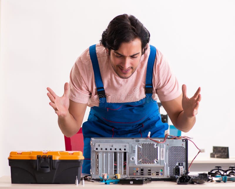 Young Male Contractor Repairing Computer Stock Photo - Image of board ...