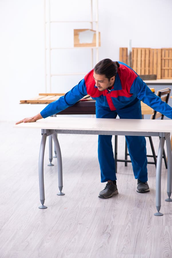 Young Male Contractor Working in Workshop Stock Photo - Image of ...