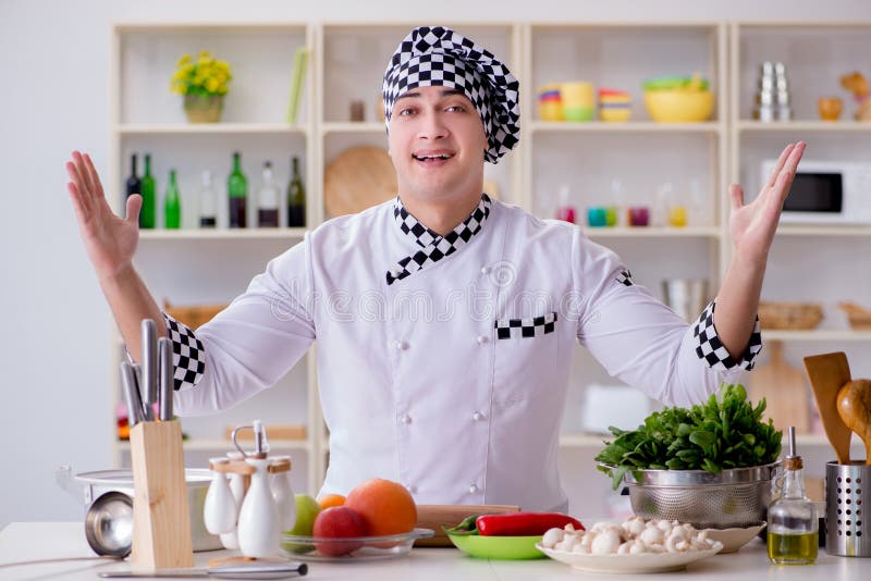 The Young Male Cook Working in the Kitchen Stock Image - Image of apron ...