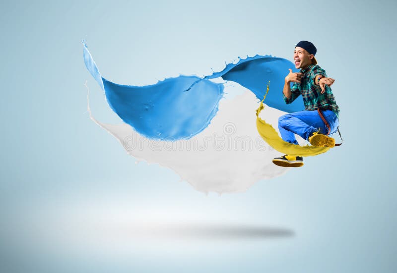 Young Male Dancer Jumping with Splash of Paint Stock Photo - Image of ...