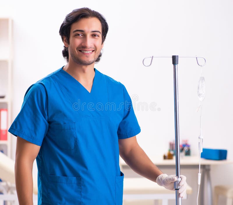 Young Male Doctor in Blood Transfusion Concept Stock Image - Image of ...