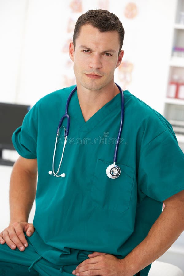 Young Male Doctor in Consulting Room Stock Photo - Image of consultant ...