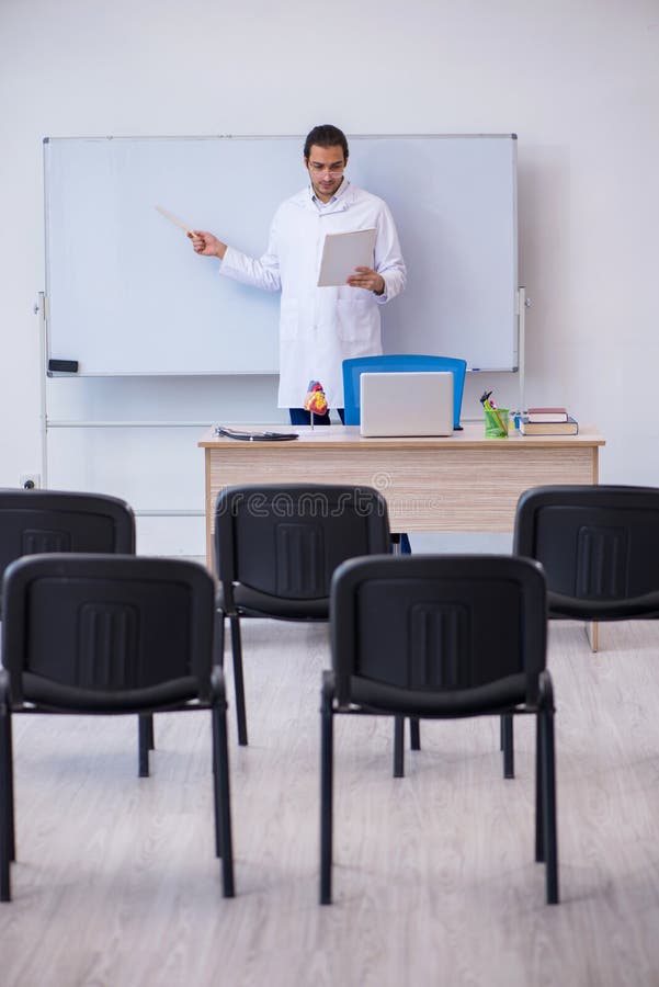 Young Male Doctor Giving Seminar in the Classroom Stock Photo - Image ...