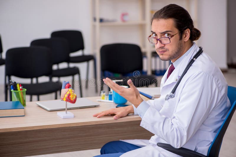 Young Male Doctor Giving Seminar in the Classroom Stock Image - Image ...