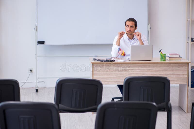 Young Male Doctor Giving Seminar in the Classroom Stock Image - Image ...