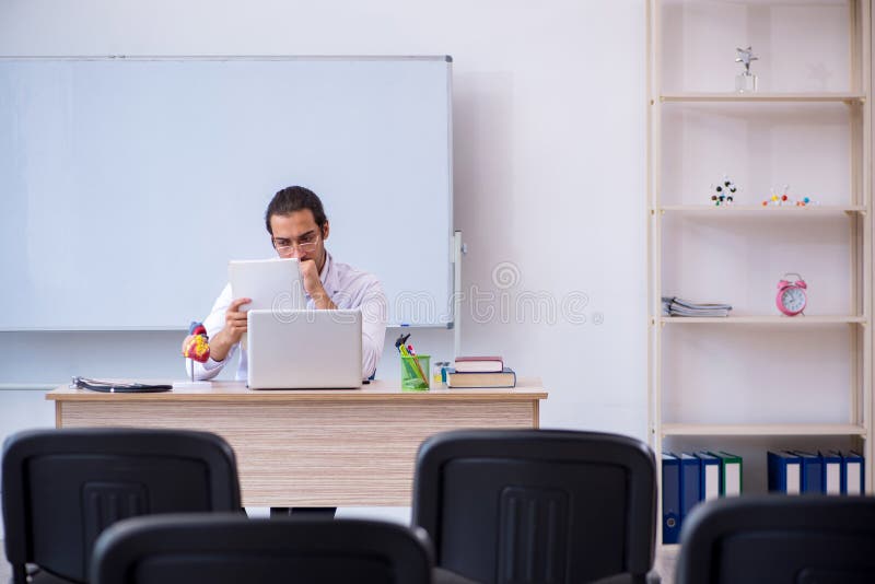 Young Male Doctor Giving Seminar in the Classroom Stock Image - Image ...