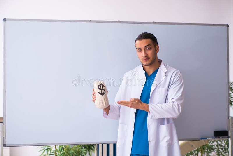 Young Male Doctor in Presentation Concept Stock Photo - Image of ...