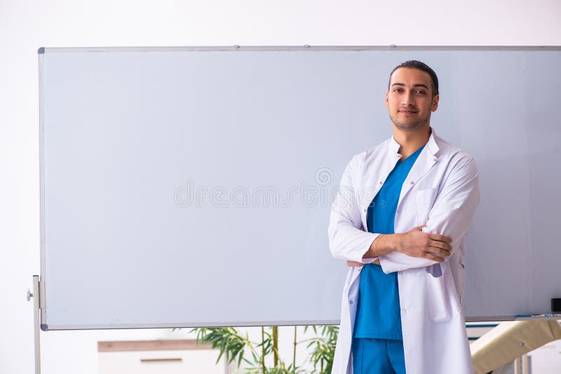 Young Male Doctor in Presentation Concept Stock Photo - Image of board ...