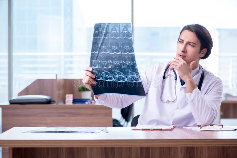 Young Male Doctor Radiologist Working in the Clinic Stock Photo - Image ...