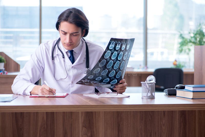 The Young Male Doctor Radiologist Working in the Clinic Stock Image ...