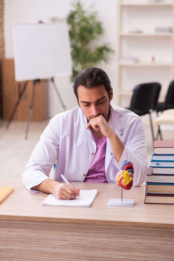 Young Male Doctor Student Cardiologist Sitting in the Classroom Stock ...