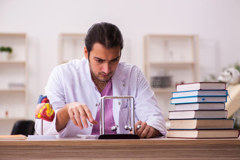 Young Male Doctor Student Sitting in the Classroom Stock Photo - Image ...