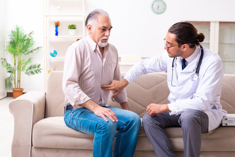 Young Male Doctor Visiting Old Patient at Home Stock Image - Image of ... Young Male Doctor Visiting Old Patient at Home Stock Image - Image of ...