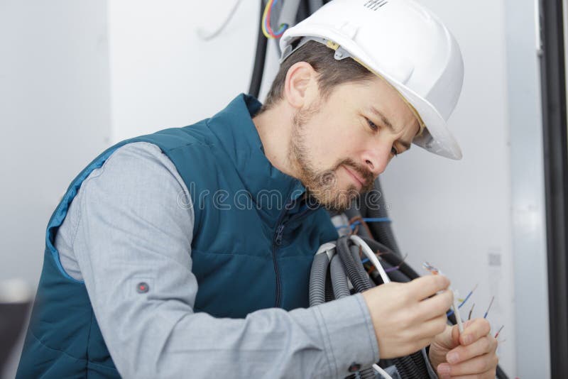Electrician Examining Current Voltage with Screwdriver Tester Stock ...