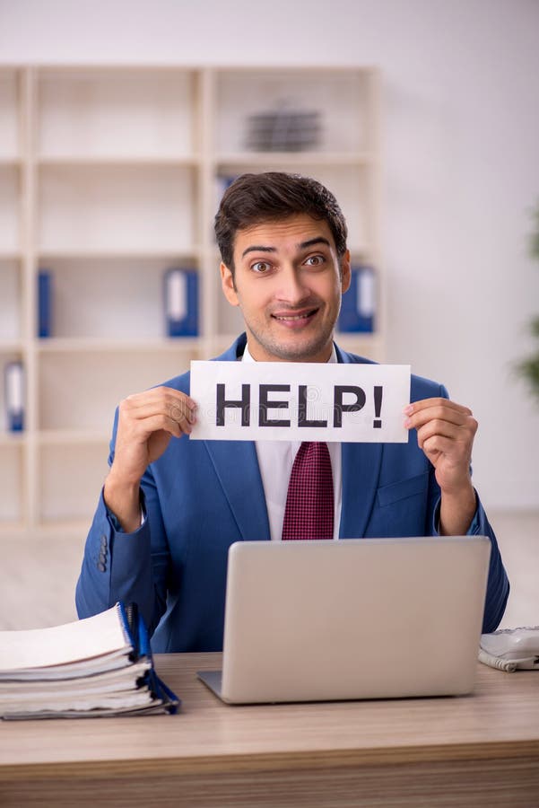 Young Male Employee Asking for Help in the Office Stock Photo - Image ...