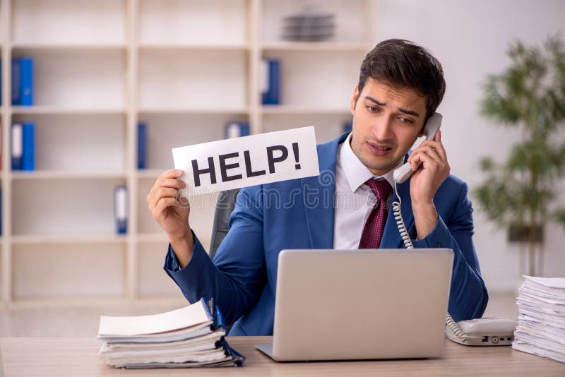 Young Male Employee Asking for Help in the Office Stock Photo - Image ...