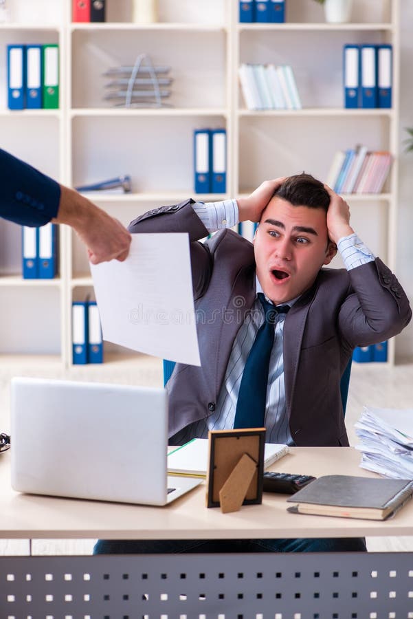 The Young Male Employee Being Fired from His Work Stock Photo - Image ...