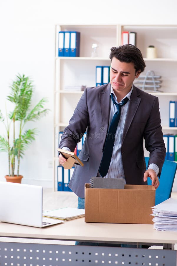 The Young Male Employee Being Fired from His Work Stock Photo - Image ...