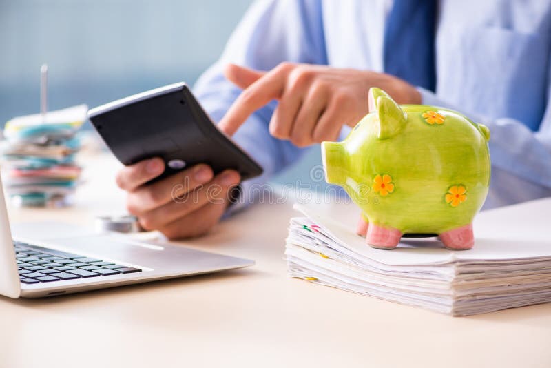 Young Male Employee in Budget Planning Concept Stock Photo - Image of ...