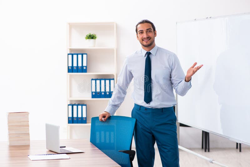 Young Male Employee in Business Presentation Concept Stock Image ...