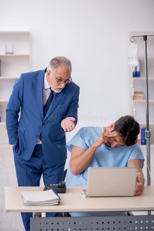 Young Male Employee Feeling Bad at Workplace Stock Photo - Image of ...