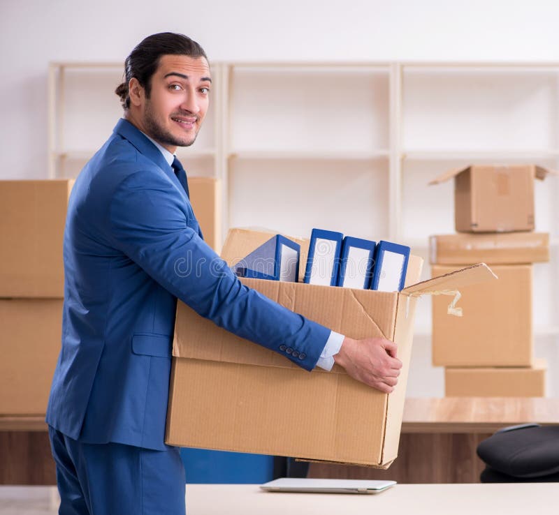 Young Male Employee in Relocation Concept Stock Photo - Image of ...
