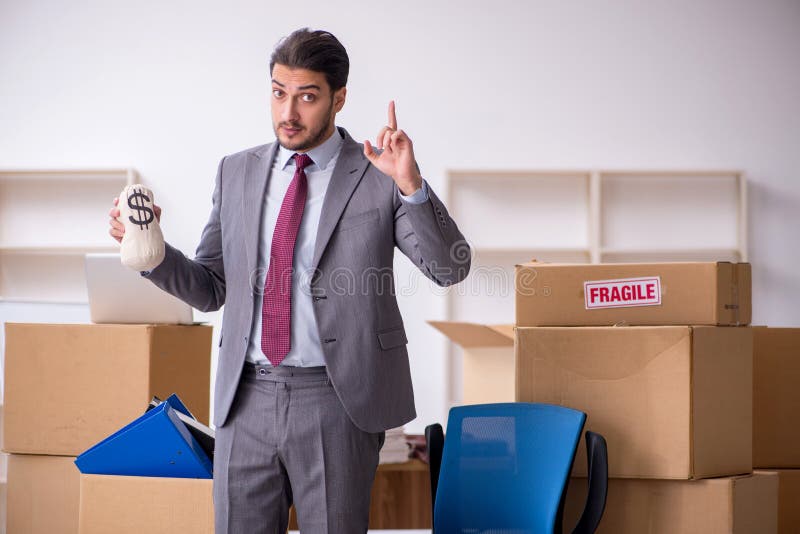 Young Male Employee in Relocation Concept Stock Photo - Image of ...