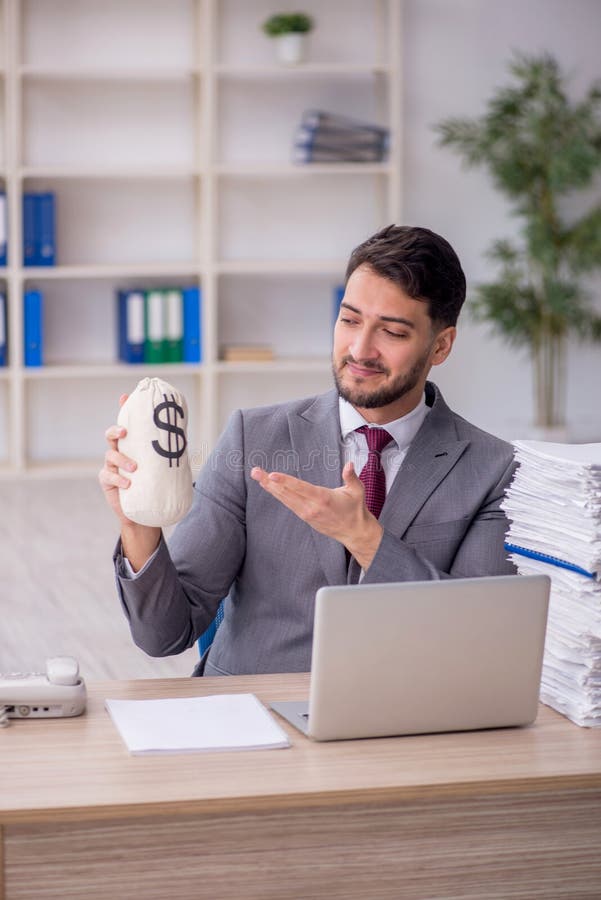 Young Male Employee in Remuneration Concept Stock Image - Image of sack ...