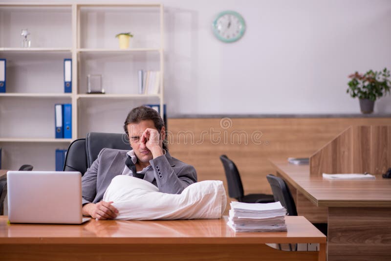 Young Male Employee Sleeping at Workplace Stock Image - Image of pillow ...