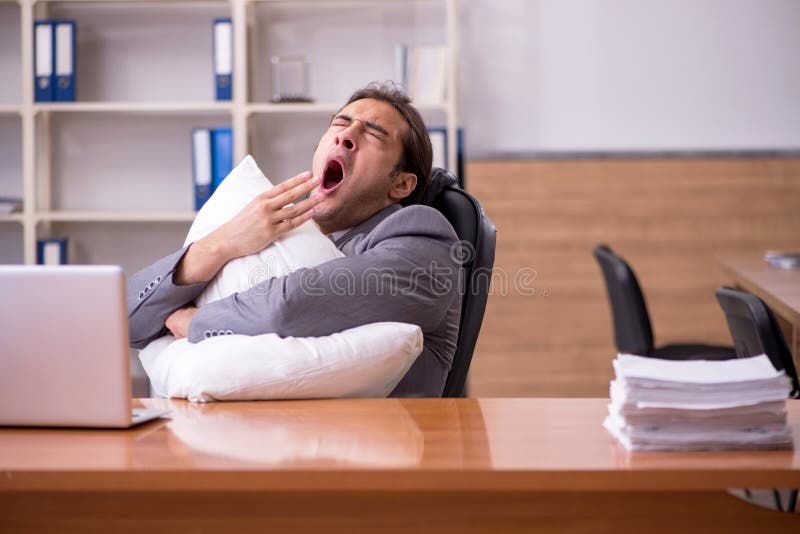 Young Male Employee Sleeping at Workplace Stock Photo - Image of ...